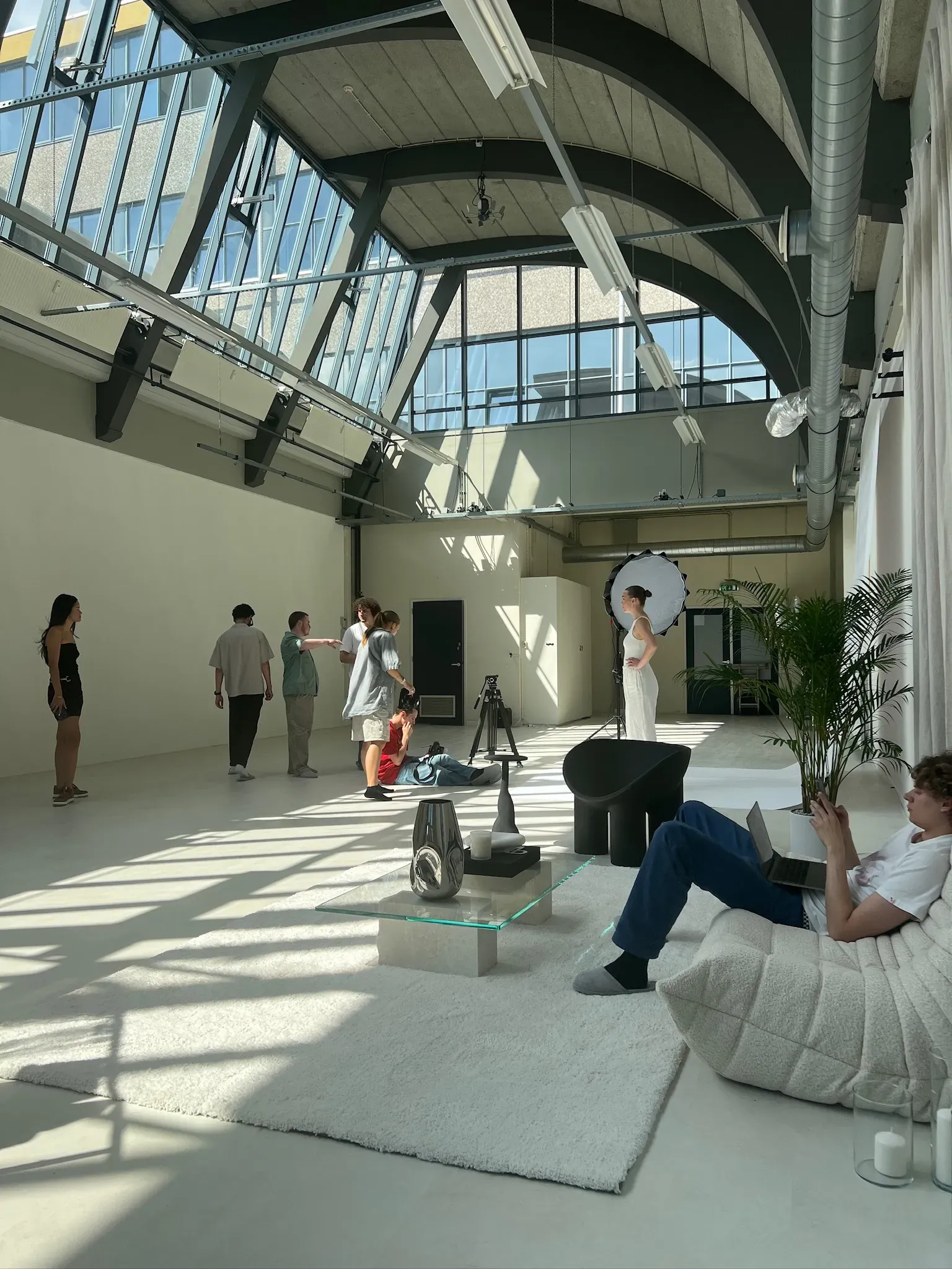 Elegant White Studio With Skylight Windows for Shoots and Workshops